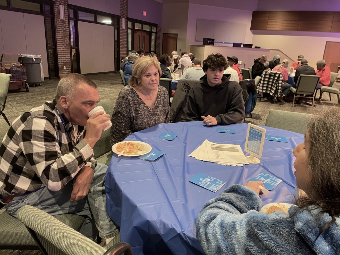 Moms and Sons Volunteer Together – Well Community